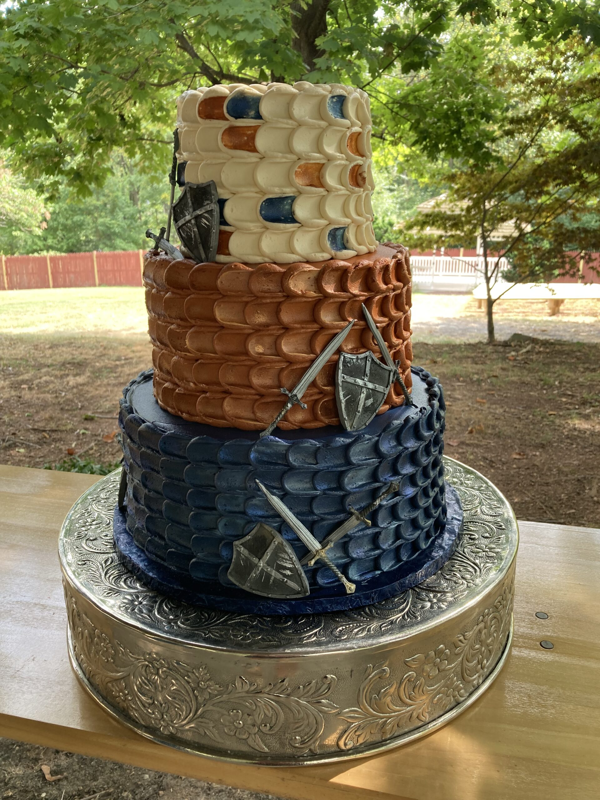 Dragon scales with swords and shields | Rosie's Creative Cakes